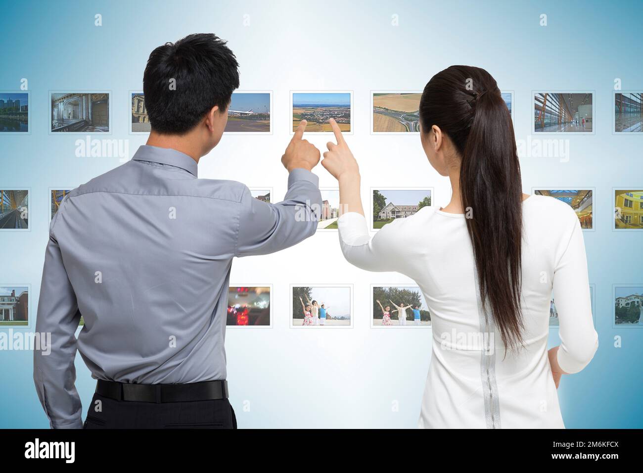 Business people use the touch screen of science and technology and the ...