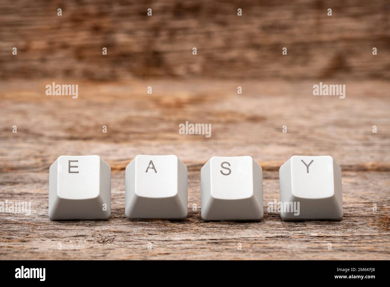 Computer keyboard keys arranged to spell EASY word Stock Photo - Alamy