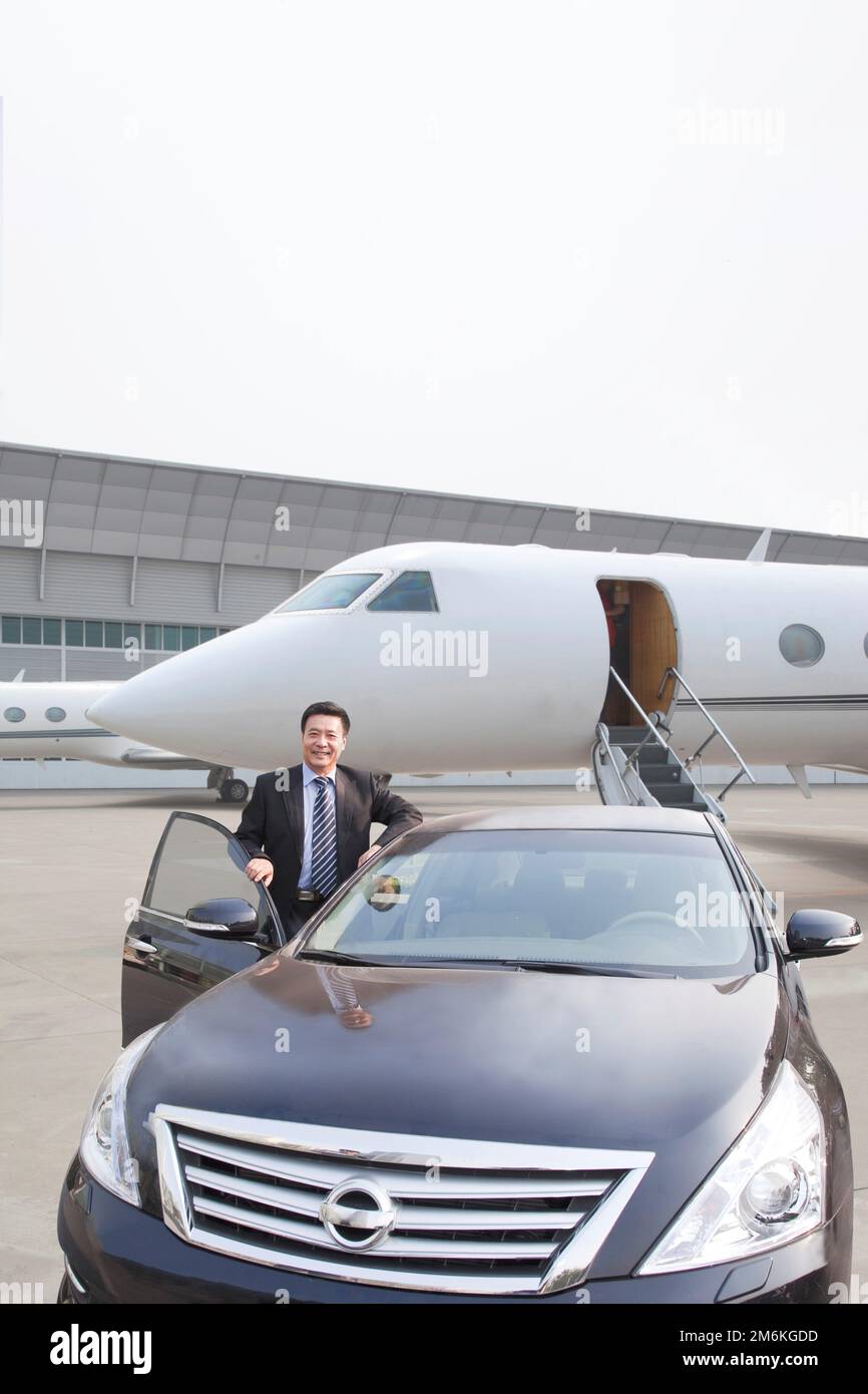 Business men arrived at the airport by car Stock Photo - Alamy