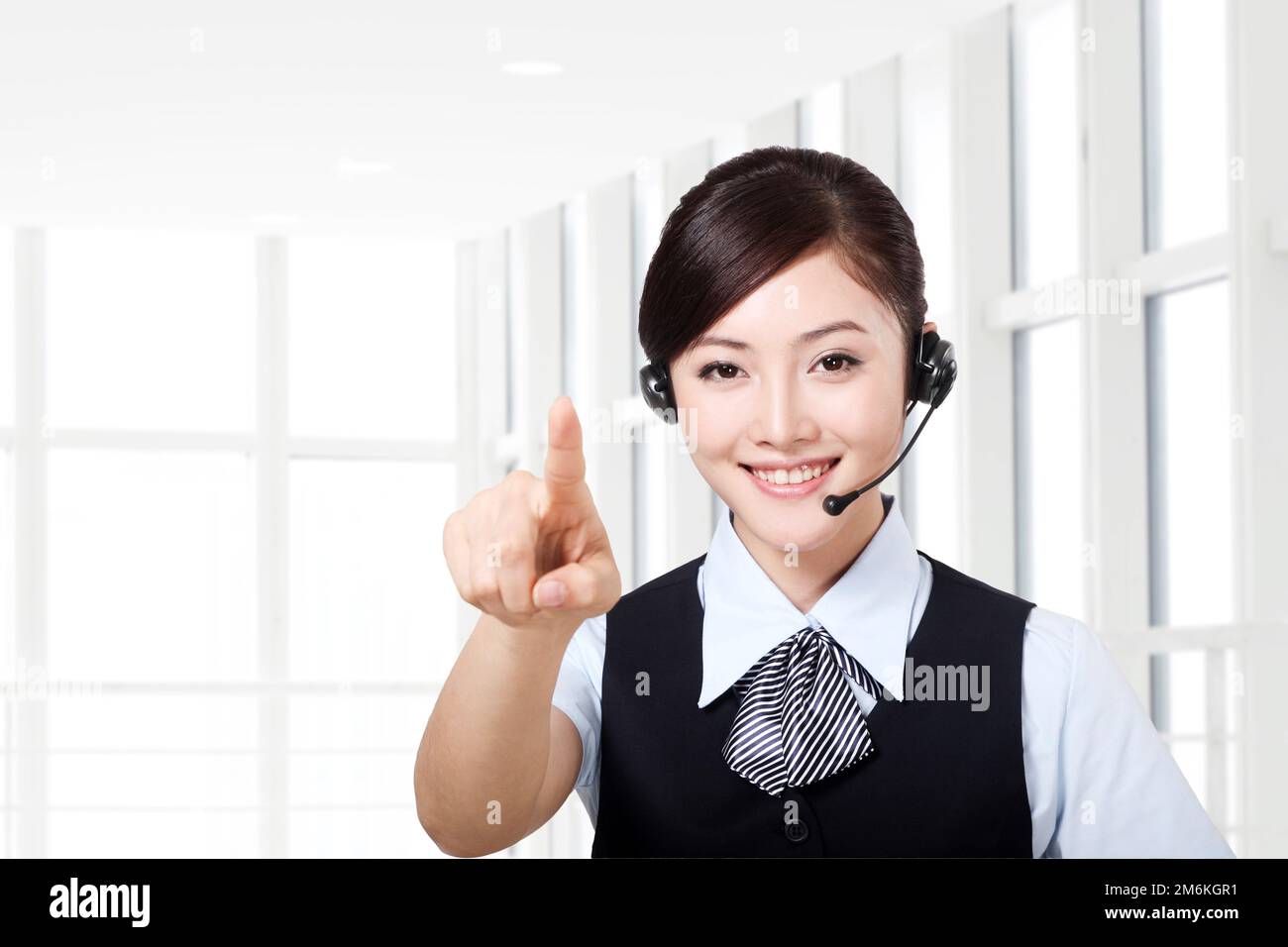 Customer service female touch Stock Photo - Alamy
