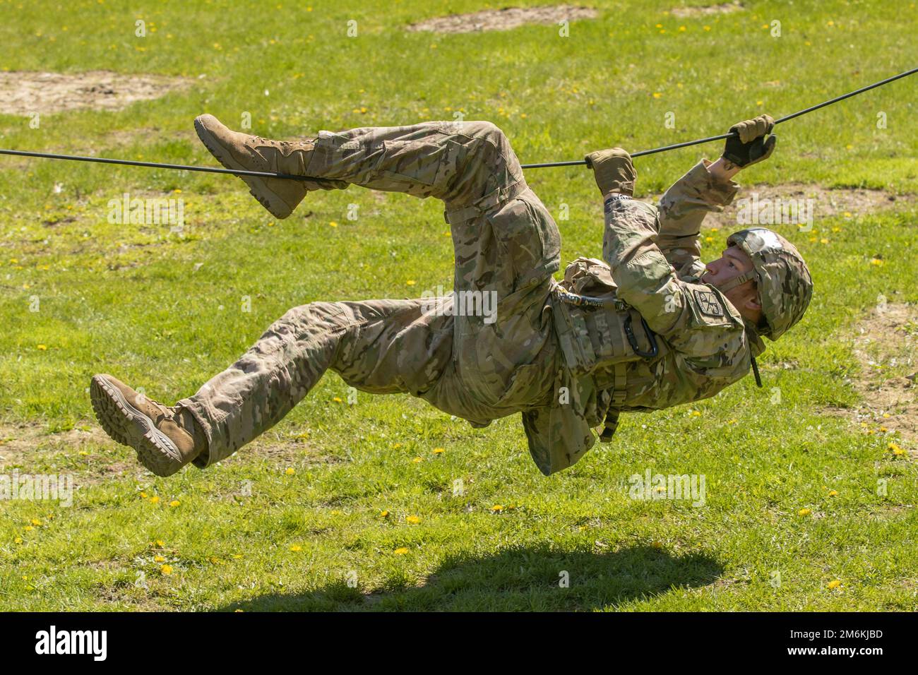 A Cadet from the University of Colorado–Colorado Springs maneuvers ...
