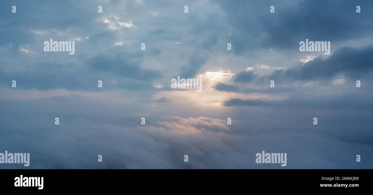 Airplane flying over pink clouds hi-res stock photography and images ...