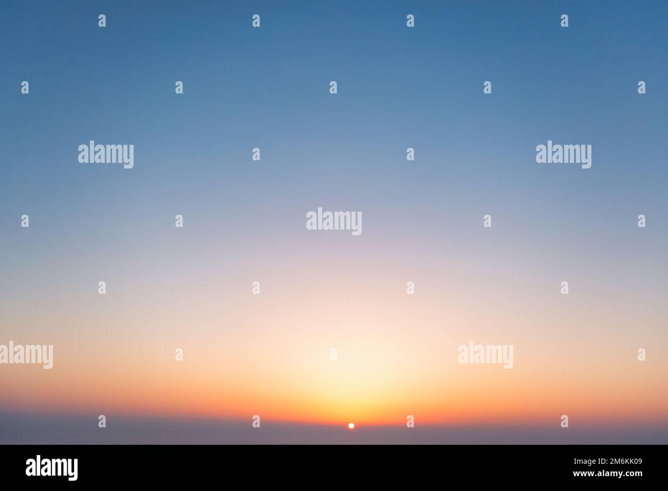 A wonderful bright dawn, above the clouds. Drone flight over the dawn ...