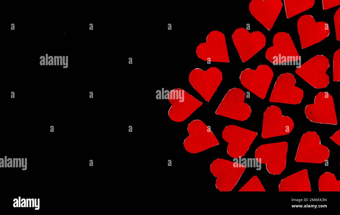 red heart on black background for valentine's day Stock Photo - Alamy