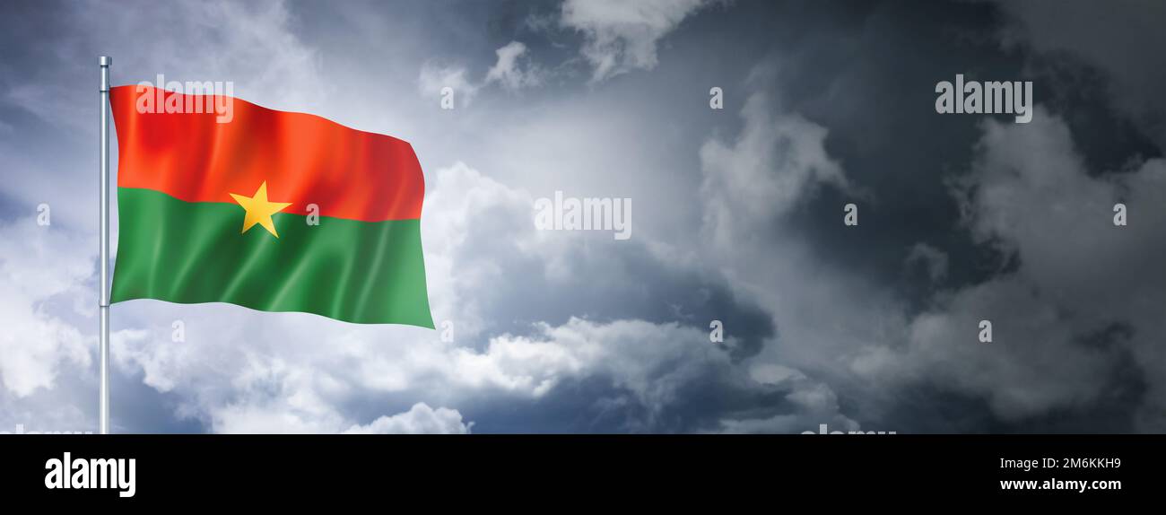 Burkina Faso flag on a cloudy sky Stock Photo - Alamy