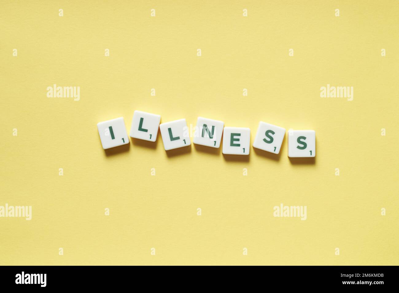 Illness formed of scrabble tiles Stock Photo - Alamy