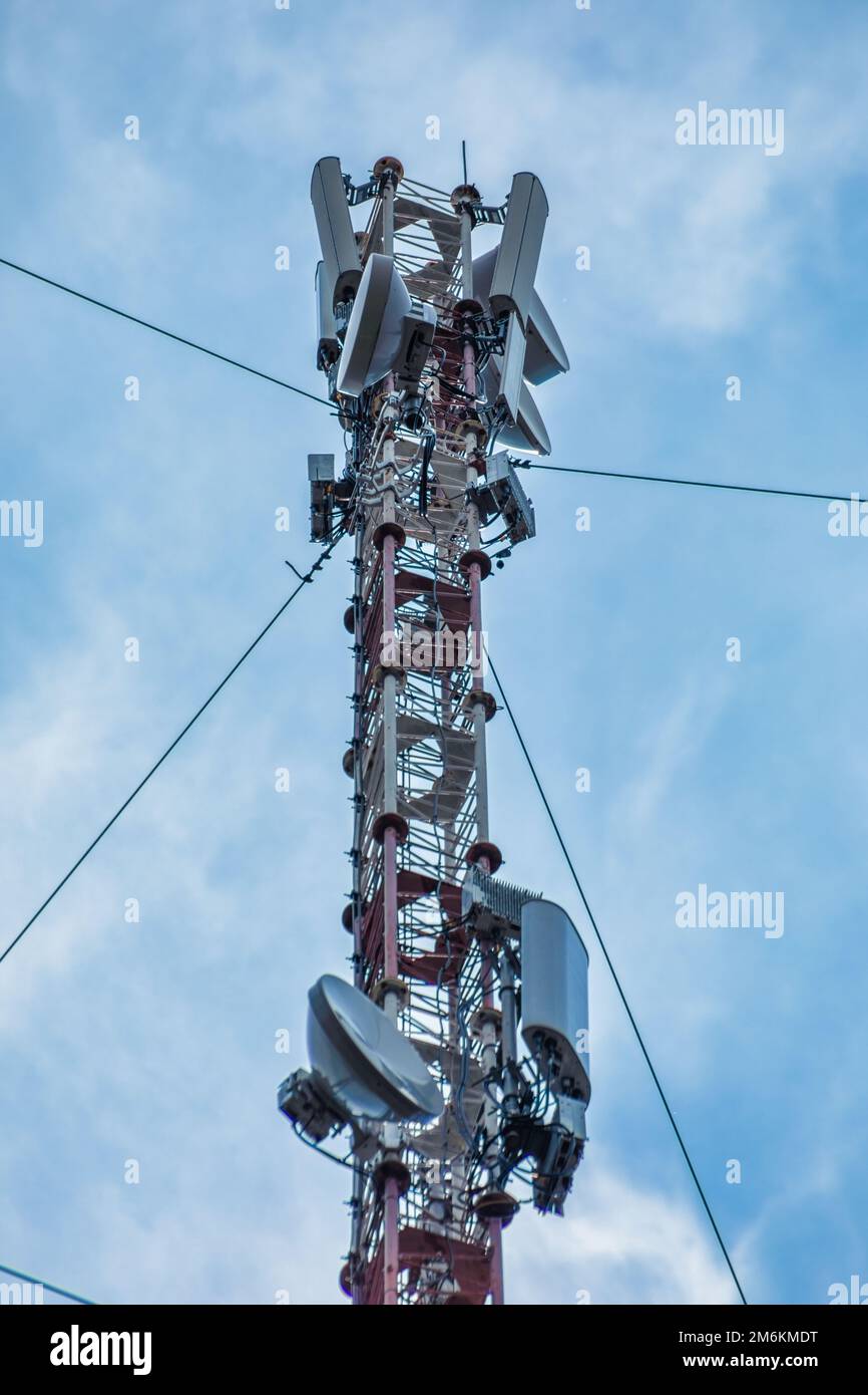 5G mobile phone tower on the background of the sky Stock Photo - Alamy
