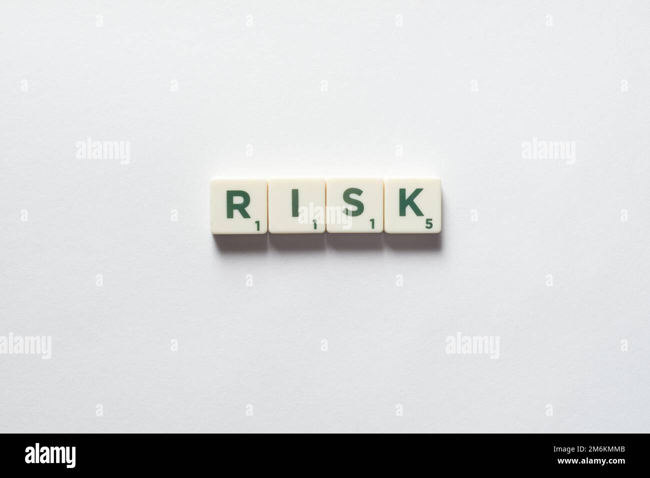 Risk formed of scrabble blocks Stock Photo - Alamy