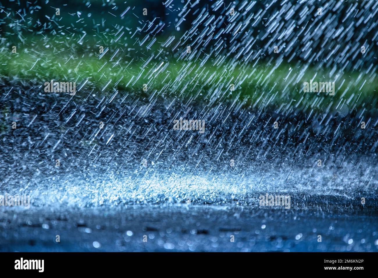 Raindrops fall on the asphalt. Deterioration of weather conditions ...