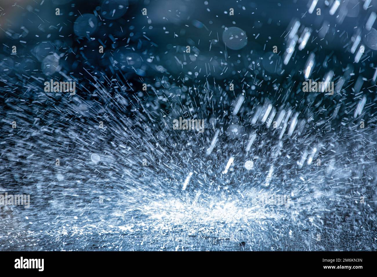 Raindrops fall on the asphalt. Deterioration of weather conditions ...