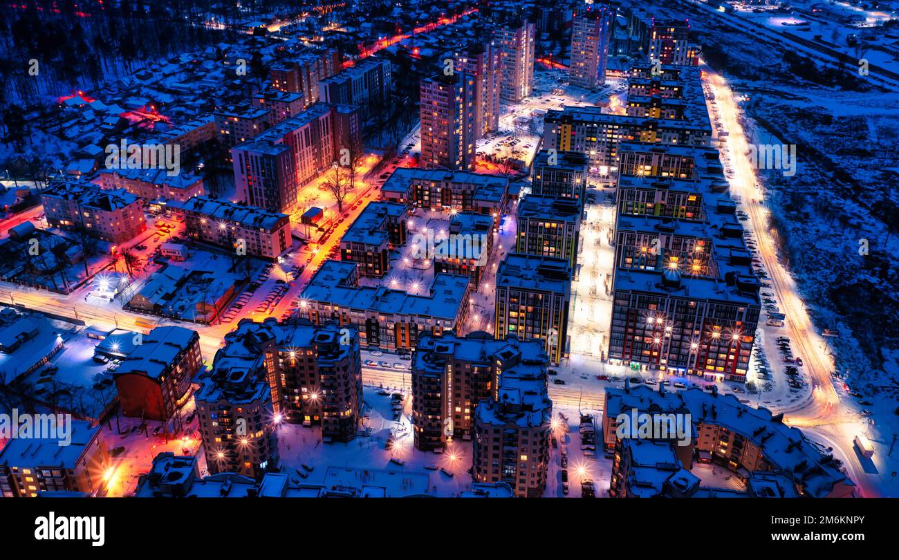 Night winter city with illuminated streets. Cityscape, drone view Stock ...