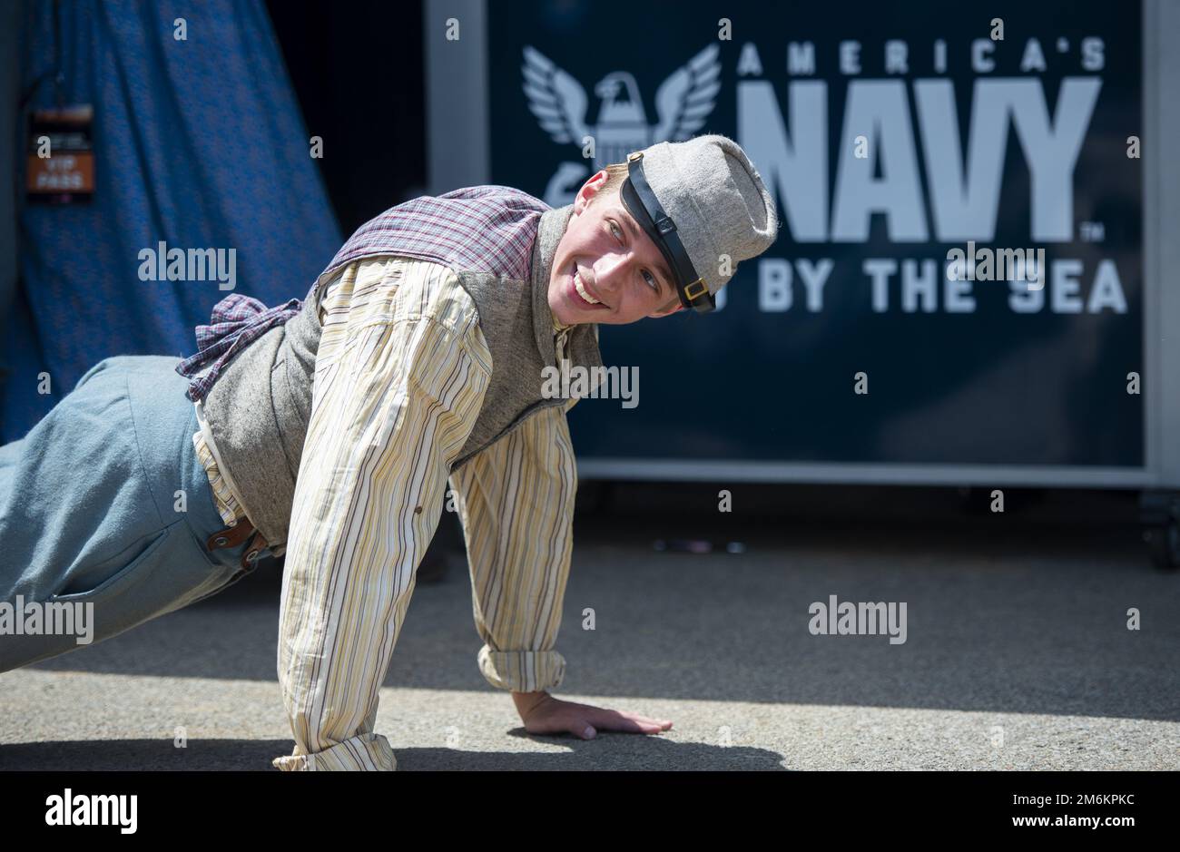 A participant performs pushups during Discovery Park of America’s 2022 ...