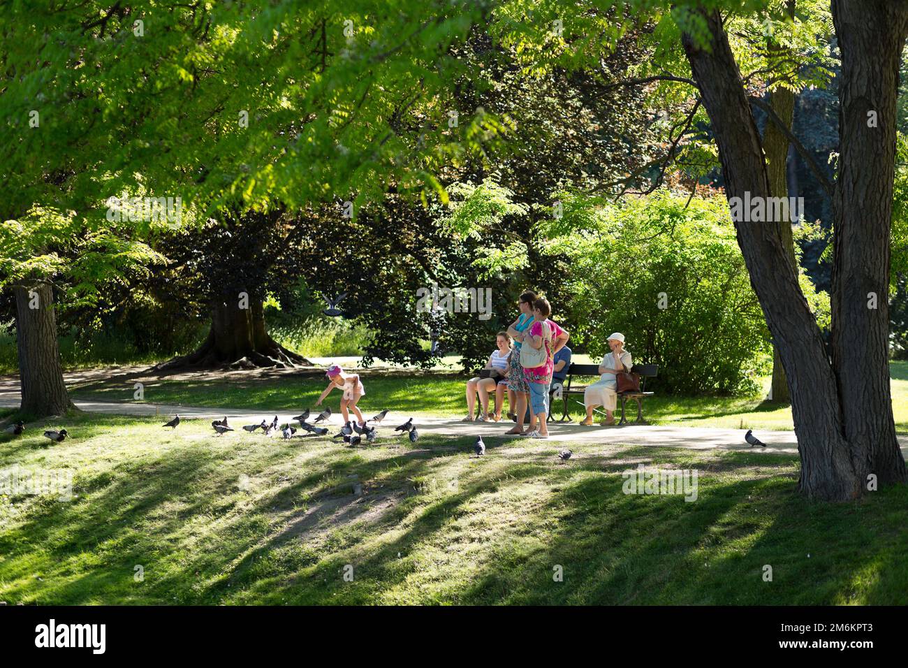 Many people rest on grass hi-res stock photography and images - Alamy