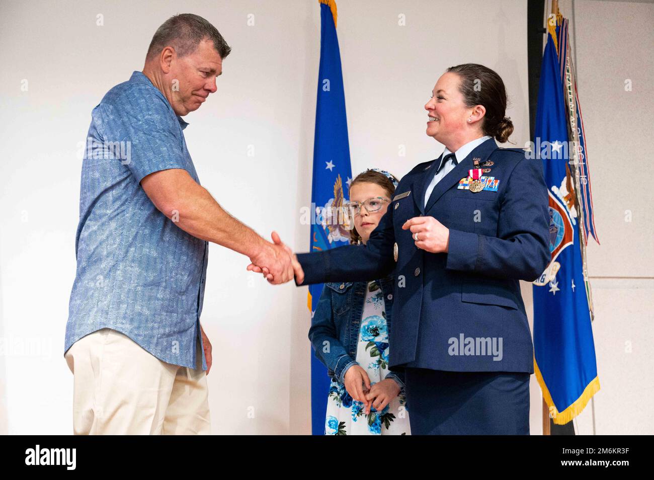 Gregg Englert, husband of newly retired U.S. Air Force Lt. Col. Melanie ...