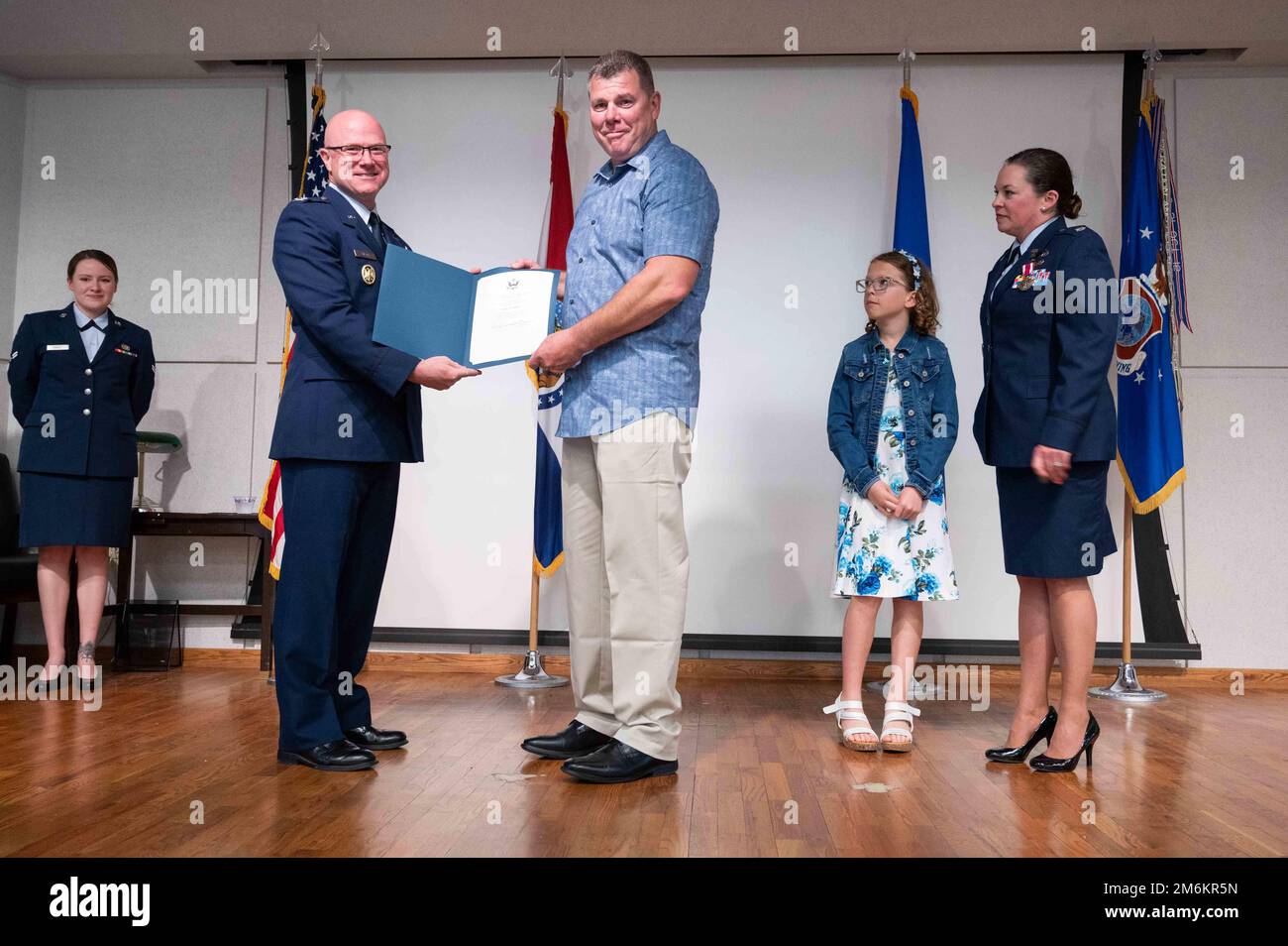 Gregg Englert, husband of newly retired U.S. Air Force Lt. Col. Melanie ...