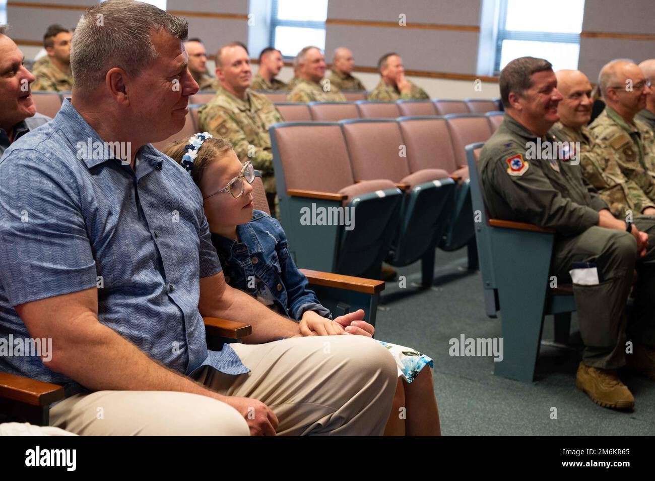 Family members of newly retired U.S. Air Force Lt. Col. Melanie Englert ...