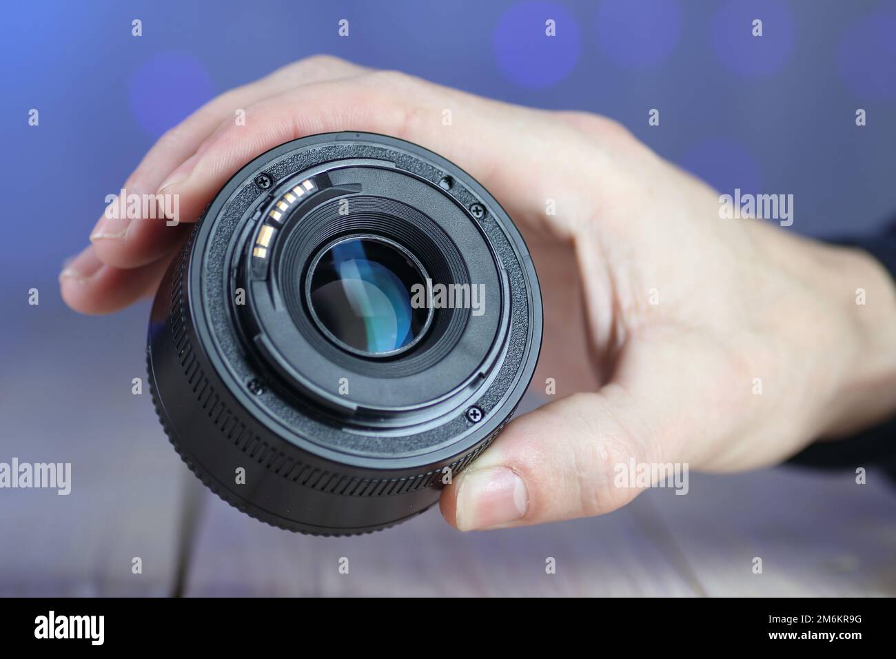 the back of the chinese lens on the table and colored background Stock ...