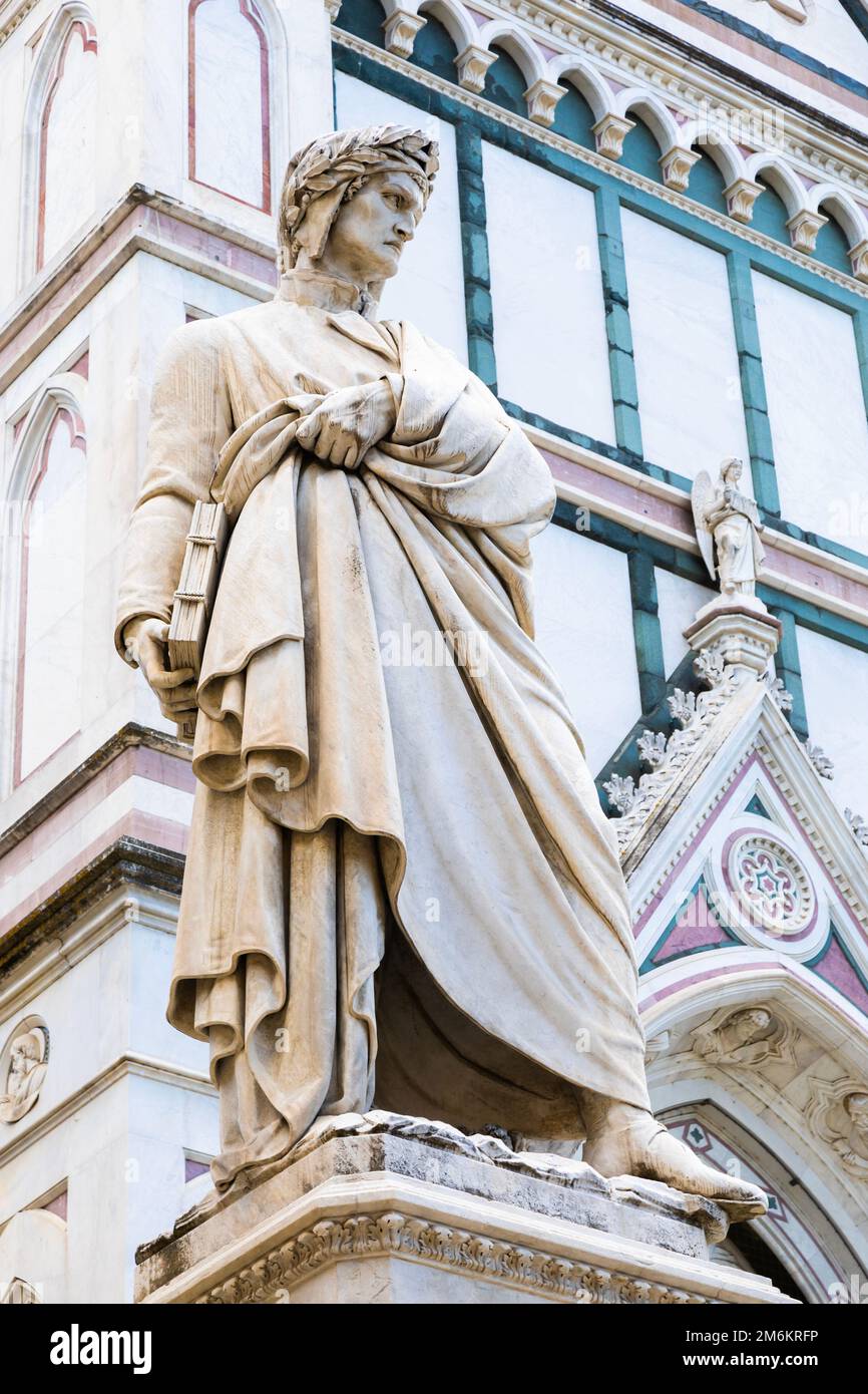 Dante Alighieri statue in Florence, Tuscany region, Italy. Amazing blue ...
