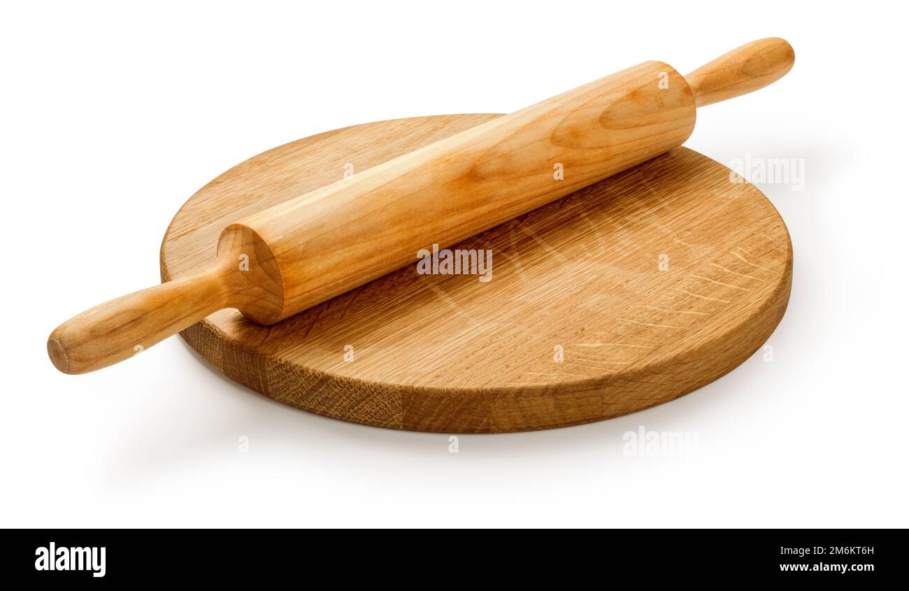 Rolling pin on wooden round board isolated. Rolling pin on white ...