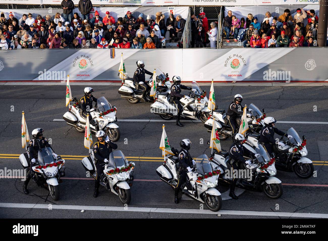 Police motorcyclists wait in formation at the start of the 134th annual ...