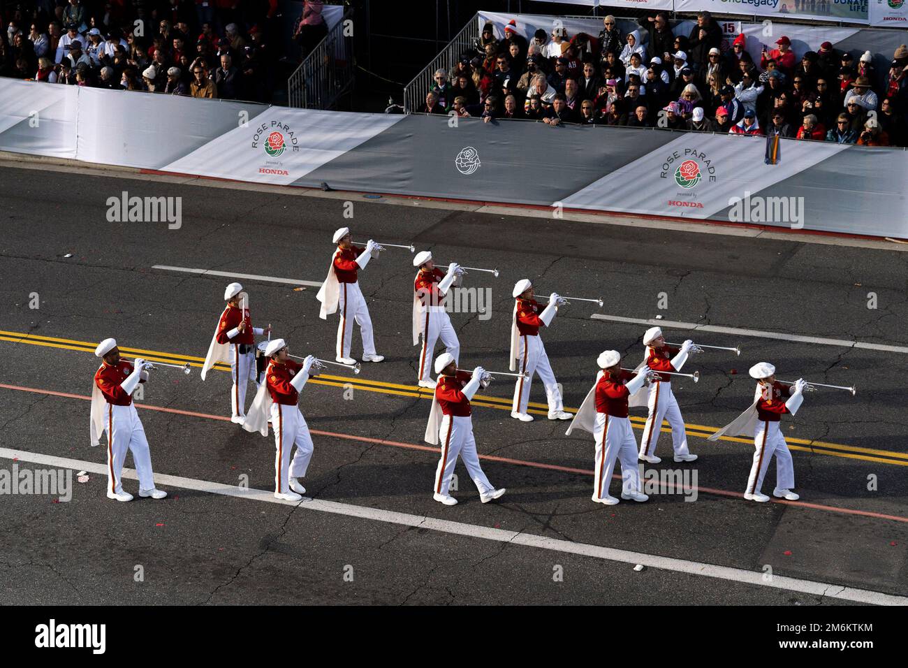 The Pasadena City College Herald Trumpets march down the street in the ...