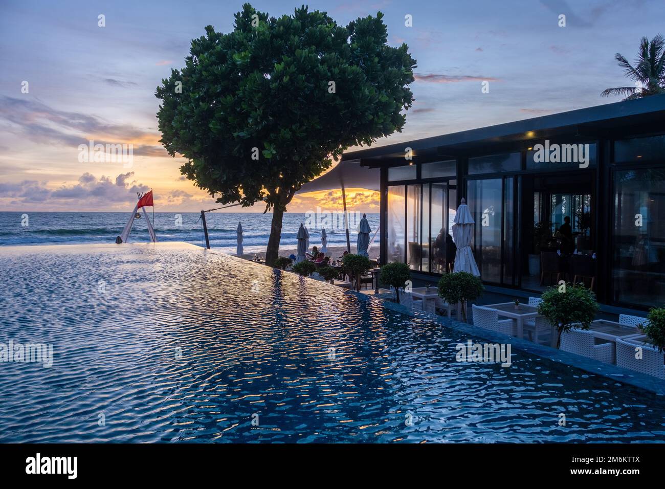Modern Infinity pool at the beach Stock Photo - Alamy