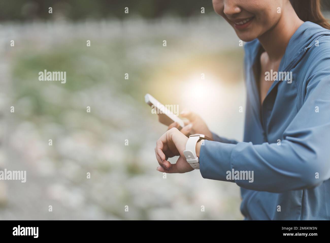 Healthy Asian woman is jogging outdoor. Fitness girl running. Female ...