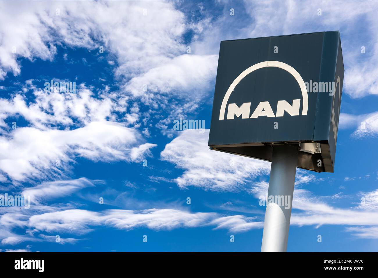 Advertising sign with the logo of the company MAN Stock Photo - Alamy
