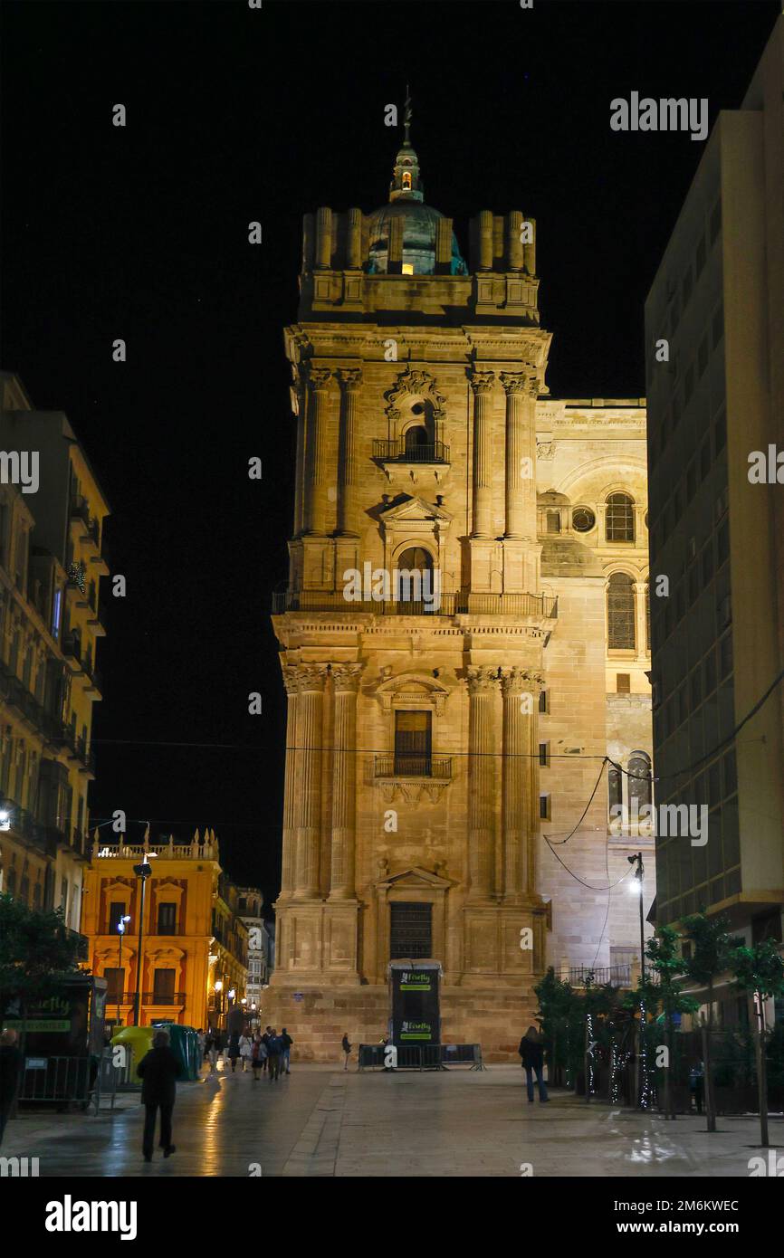 Bell tower of Cathedral lit up at night in Malaga,Andalusia, Spain ...