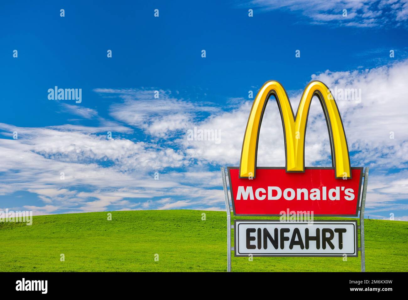 Advertising and company sign of the company Mc Donald`s Stock Photo - Alamy