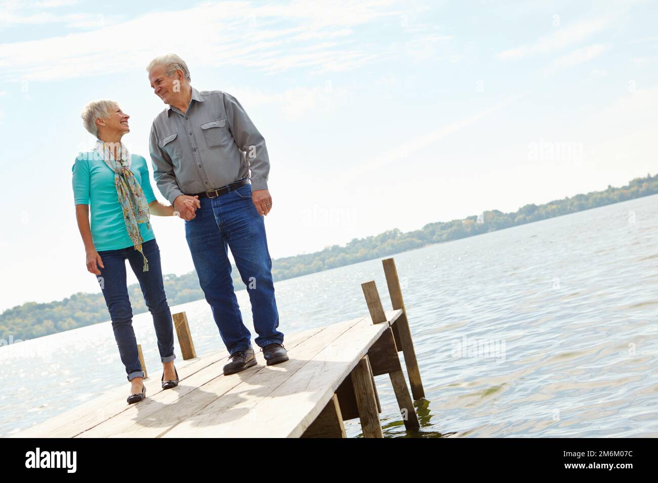 This is how we make our love last. A loving elderly couple looking at ...