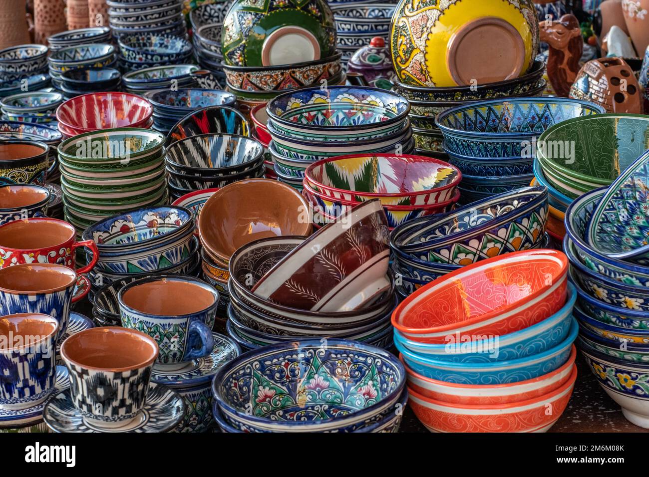 Decorative ceramic plates with traditional uzbek ornament in the street ...