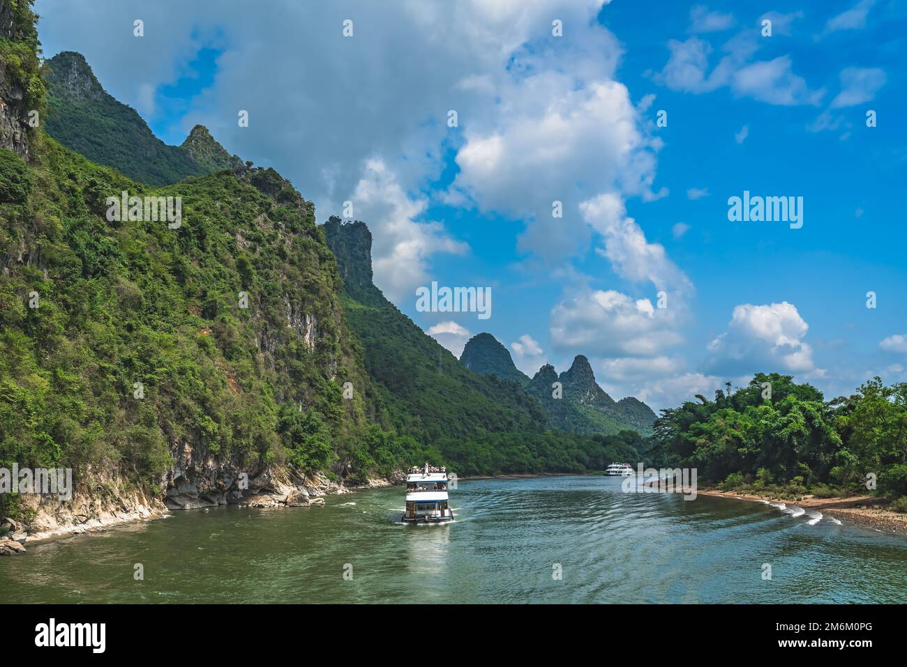 Tourist boat sailing on a Li River in China Stock Photo - Alamy