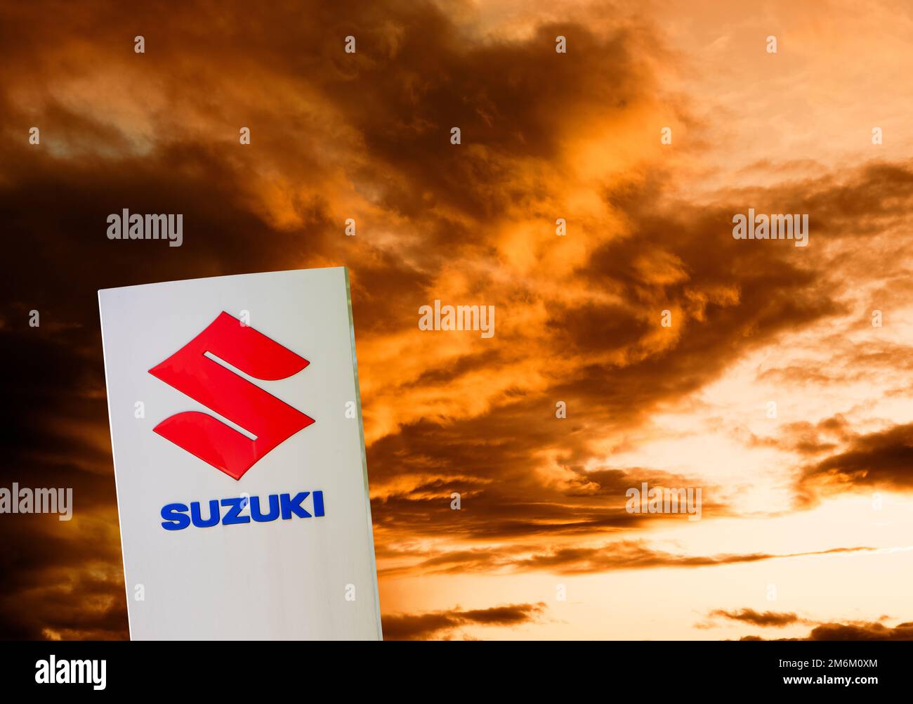 Advertising sign of the company SUZUKI Stock Photo - Alamy