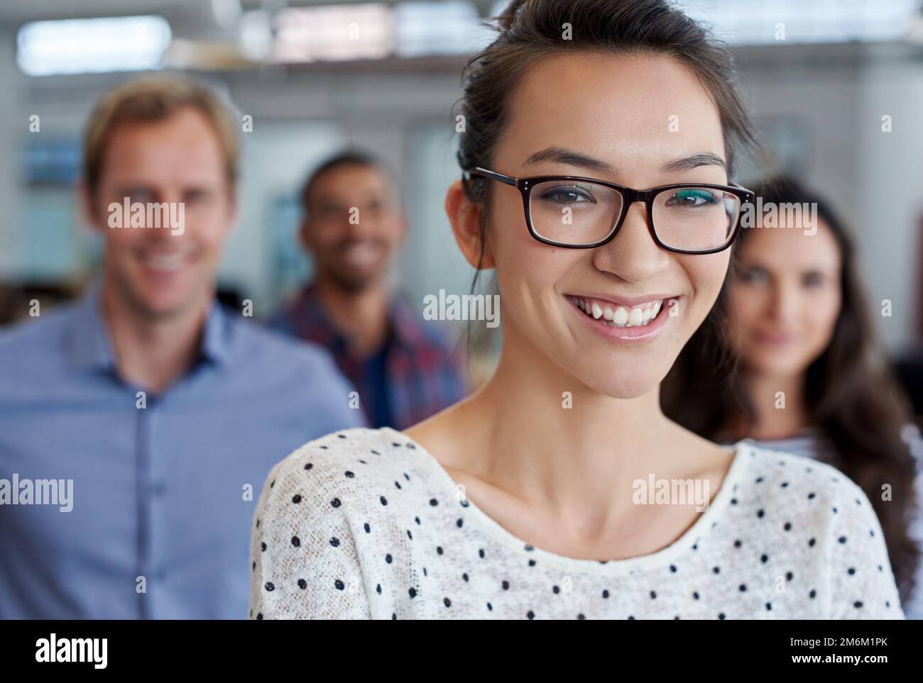 Fitting in at my new job. Closeup portrait of a beautiful young woman ...