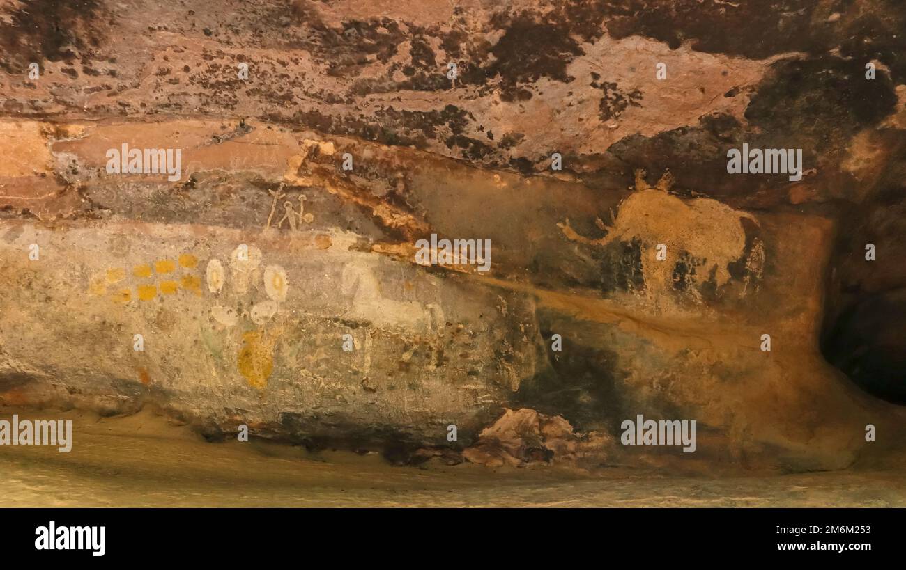 Prehistoric Rock Painting showing galloping Horse and an Elephant, Rock ...