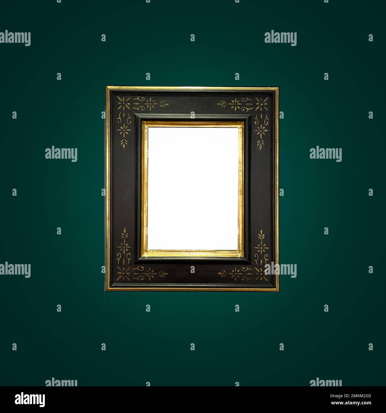 Antique art fair gallery frame on royal green wall at auction house or ...