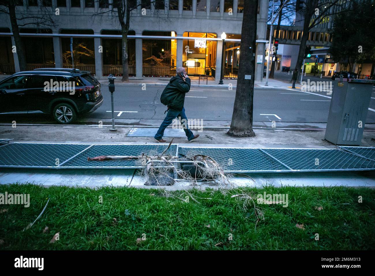 Winds from a bomb cyclone knocked down fences–for Gov. Gavin Newom's ...