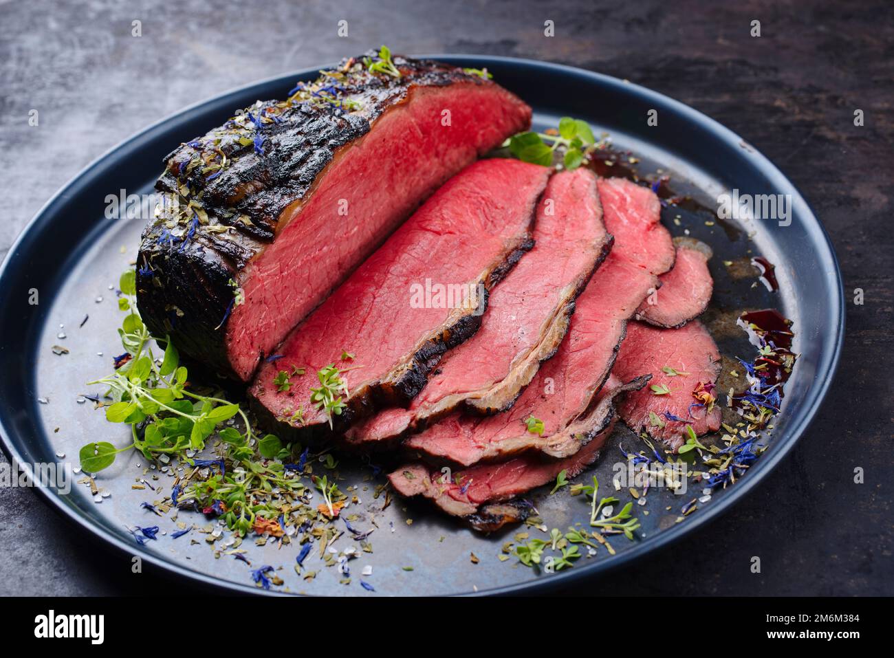 Traditional Commonwealth Sunday roast as sliced cold cuts roast beef ...