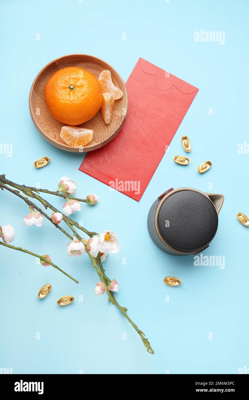 Envelope, mandarin, sakura, teapot and Chinese symbols on blue ...