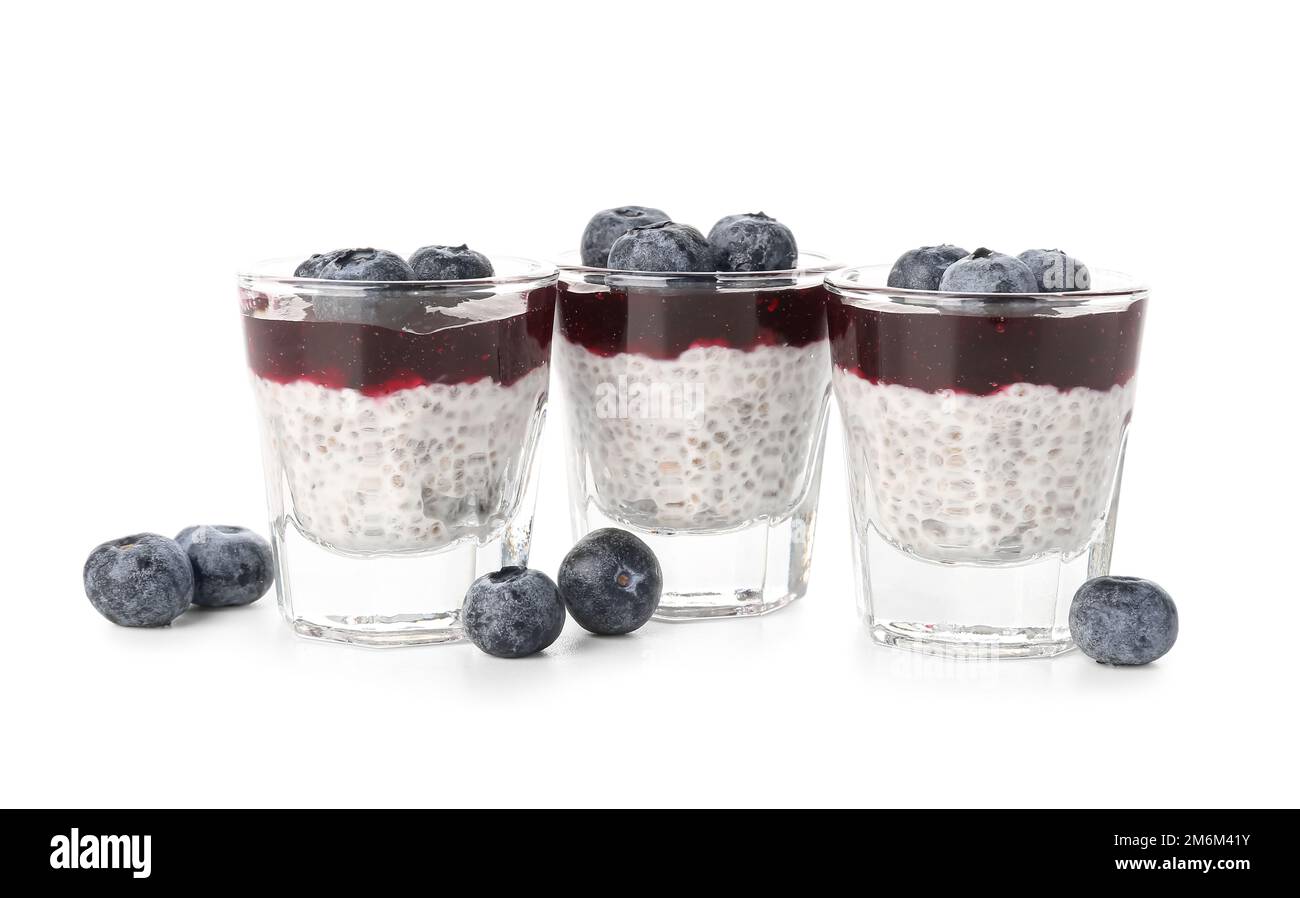Shots of delicious chia seed pudding with blueberry isolated on white ...