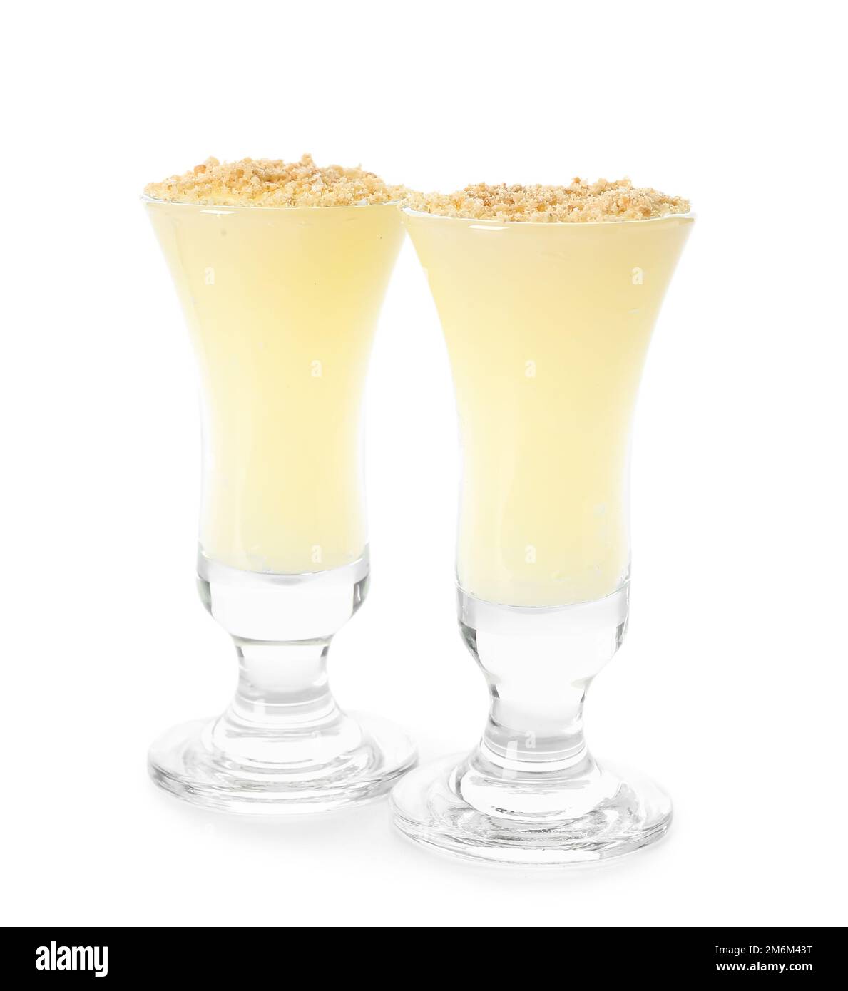Shots of delicious pudding with vanilla sticks isolated on white ...