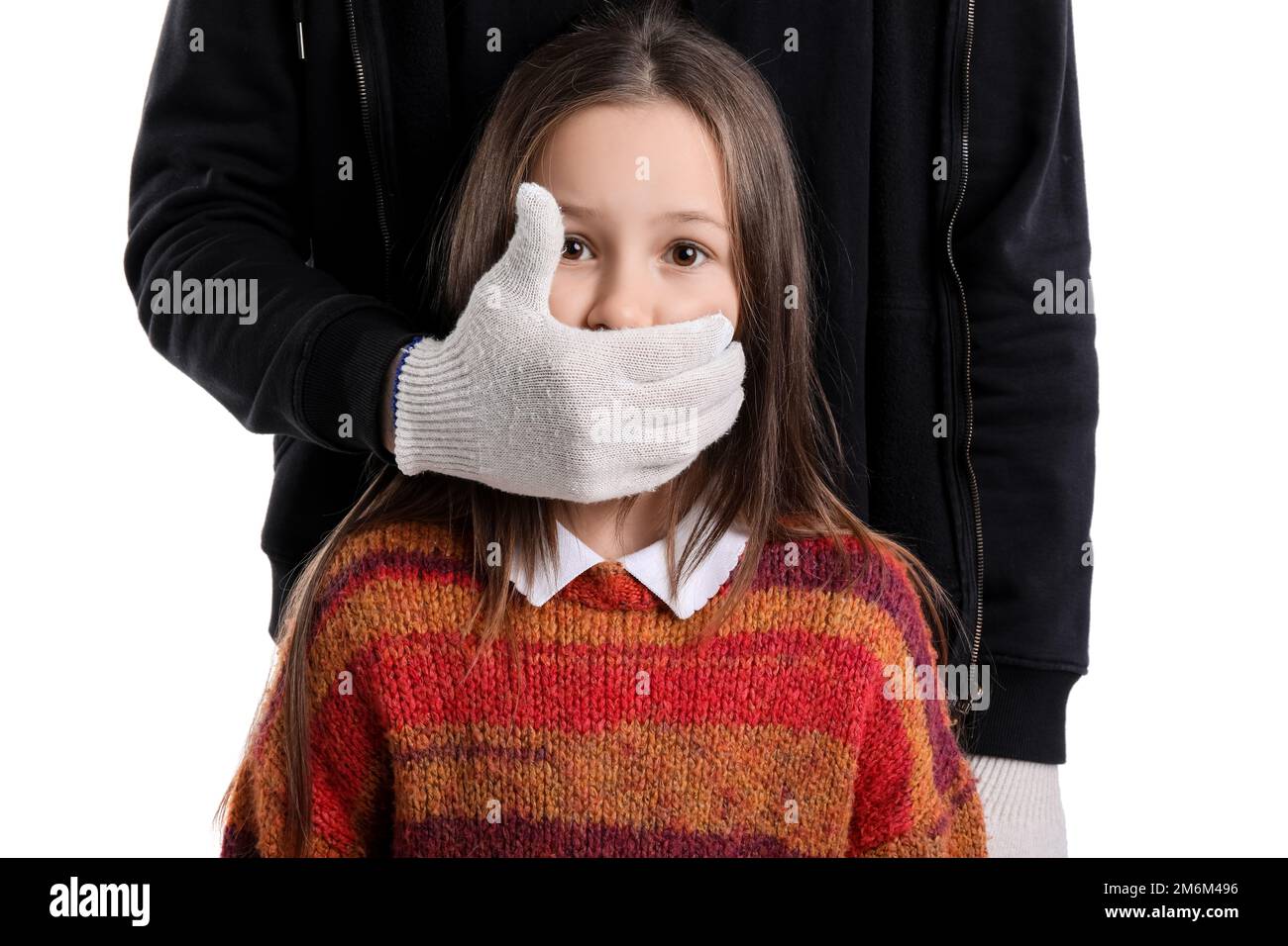Terrorist and scared little hostage on white background Stock Photo - Alamy