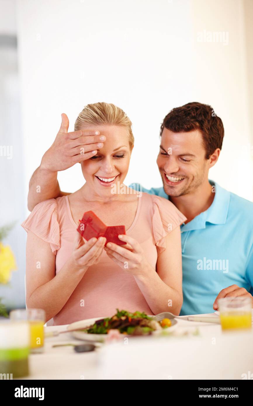 Spoil the one you love. A beautiful woman looking pleasantly surprised ...