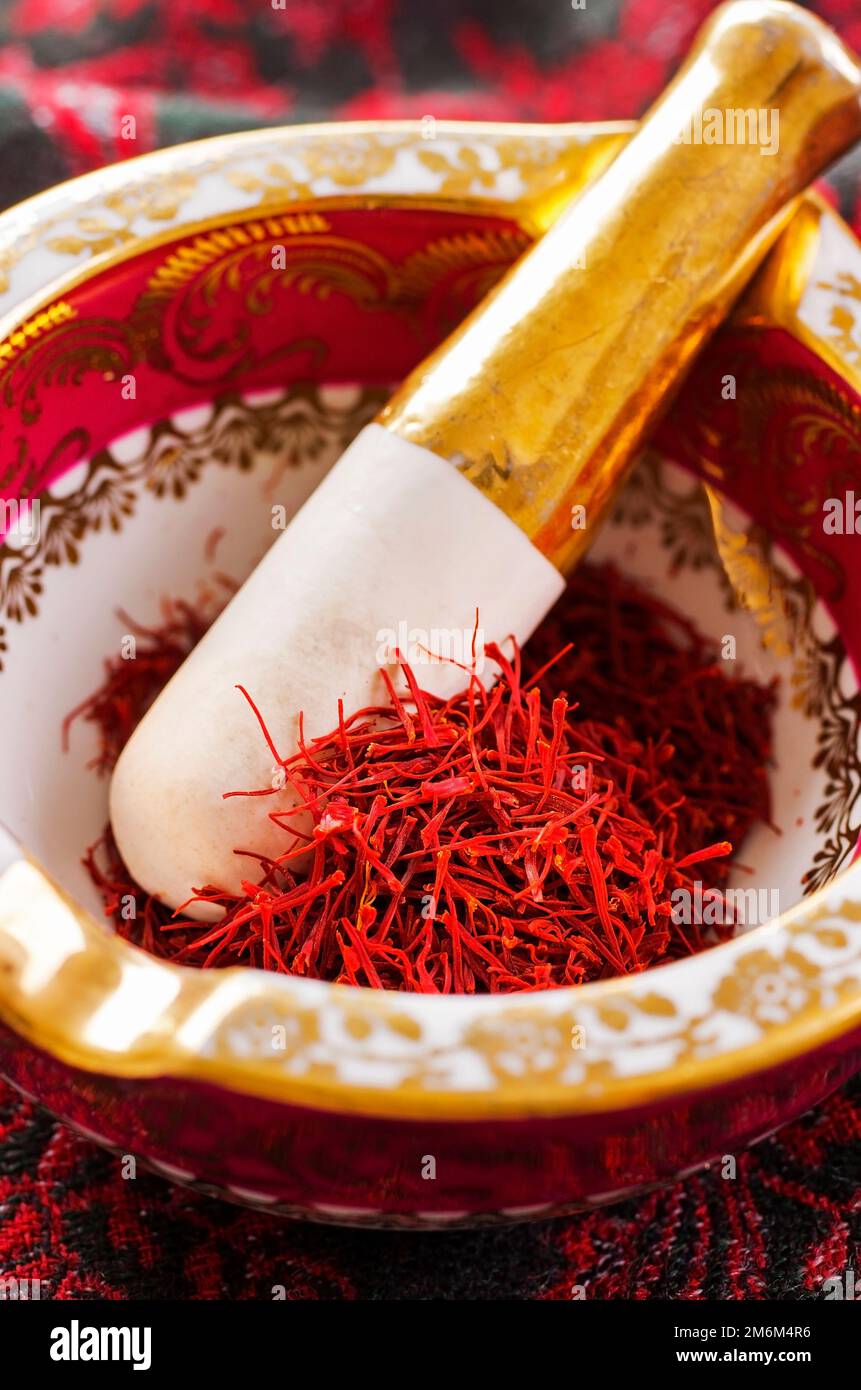 Saffron in the mortar Stock Photo - Alamy