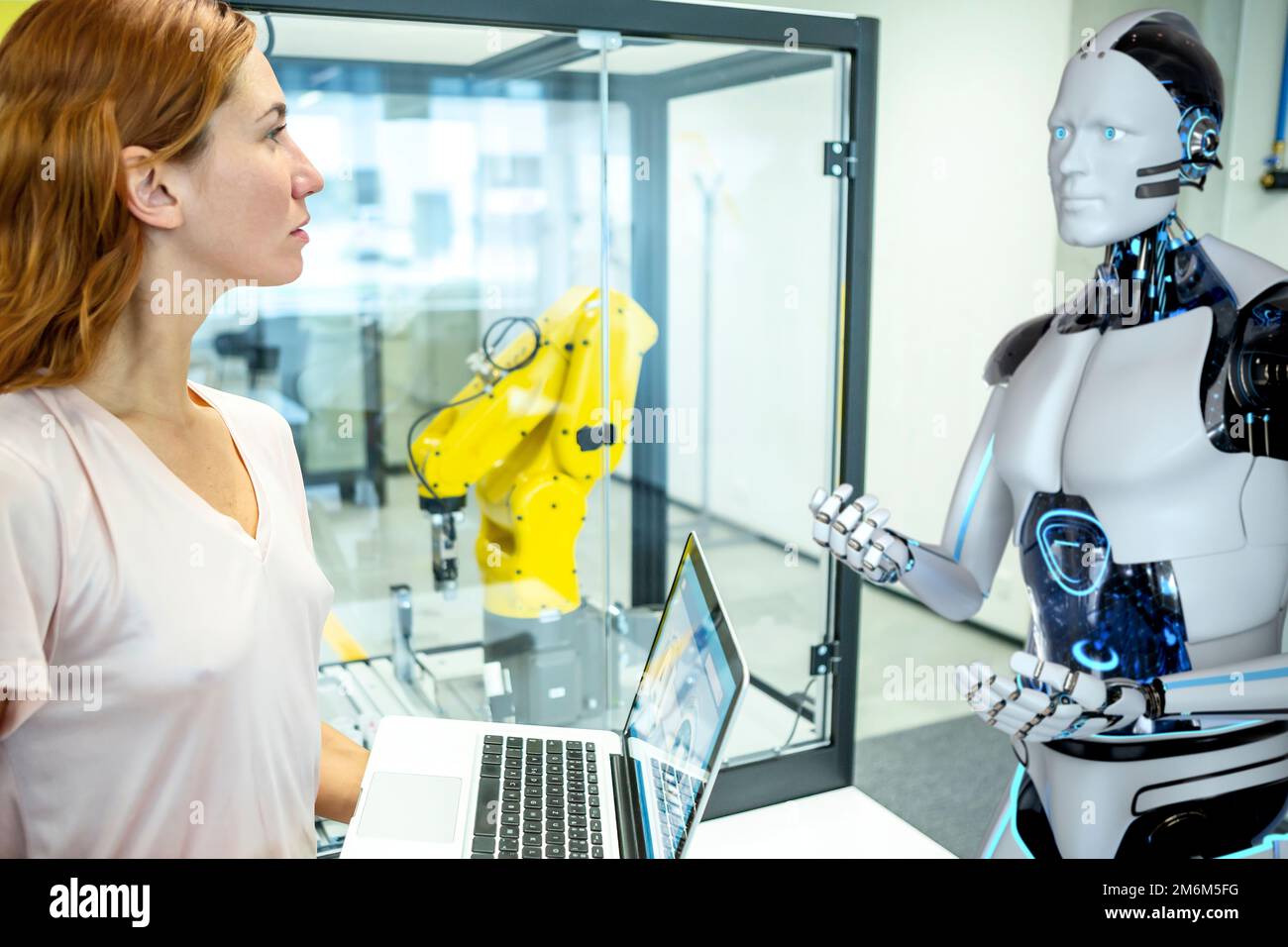 Industrial Robotic Engineer And Humanoid Robot Stock Photo - Alamy