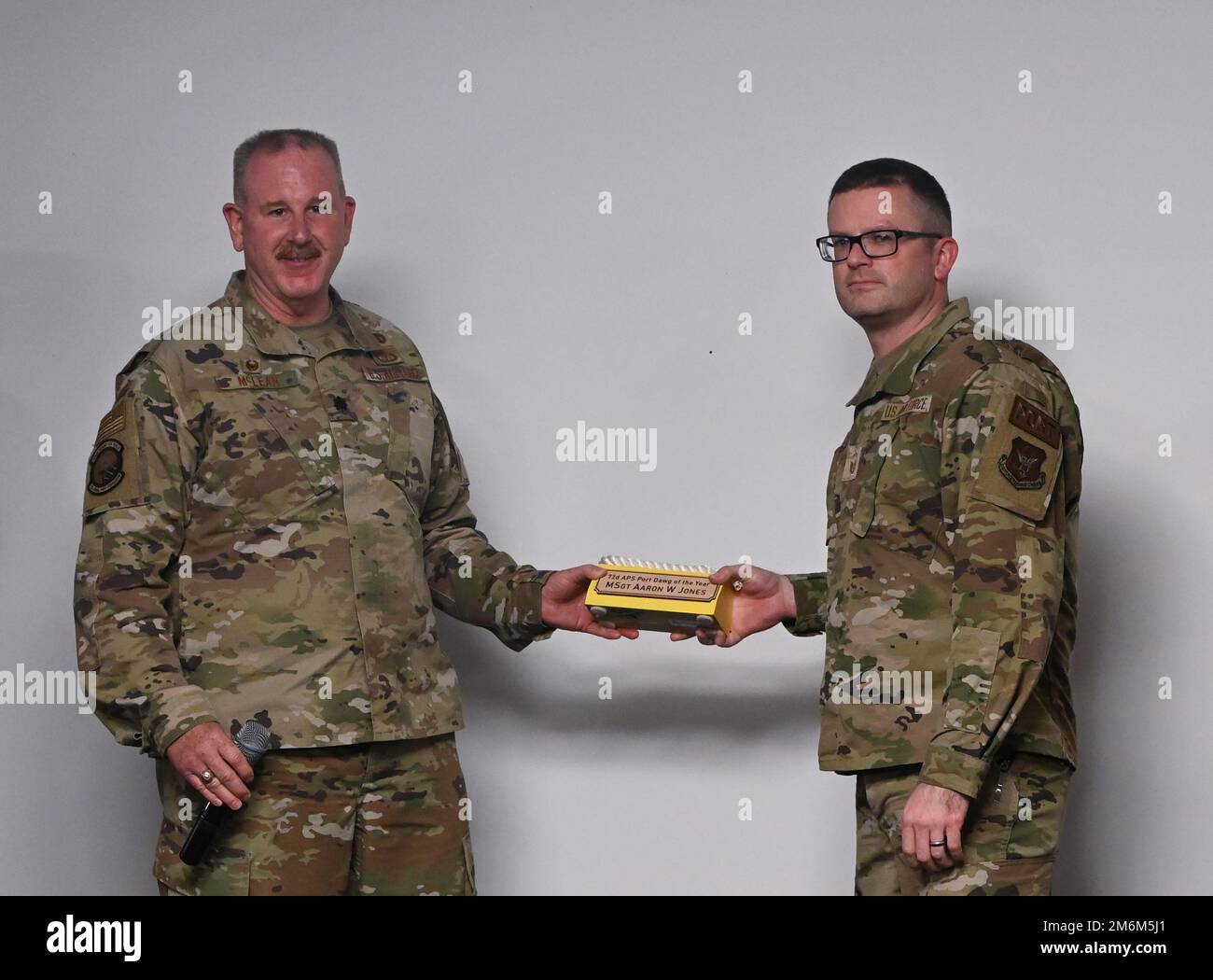Lt. Col. Darryl McLean, 72nd Aerial Port Squadron commander, presents ...