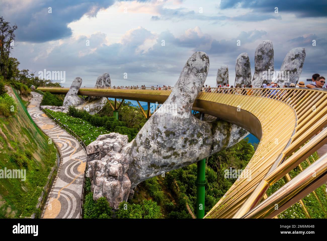 Da Nang, Vietnam - 12 Aug 2022: the Golden Bridge is lifted by two ...