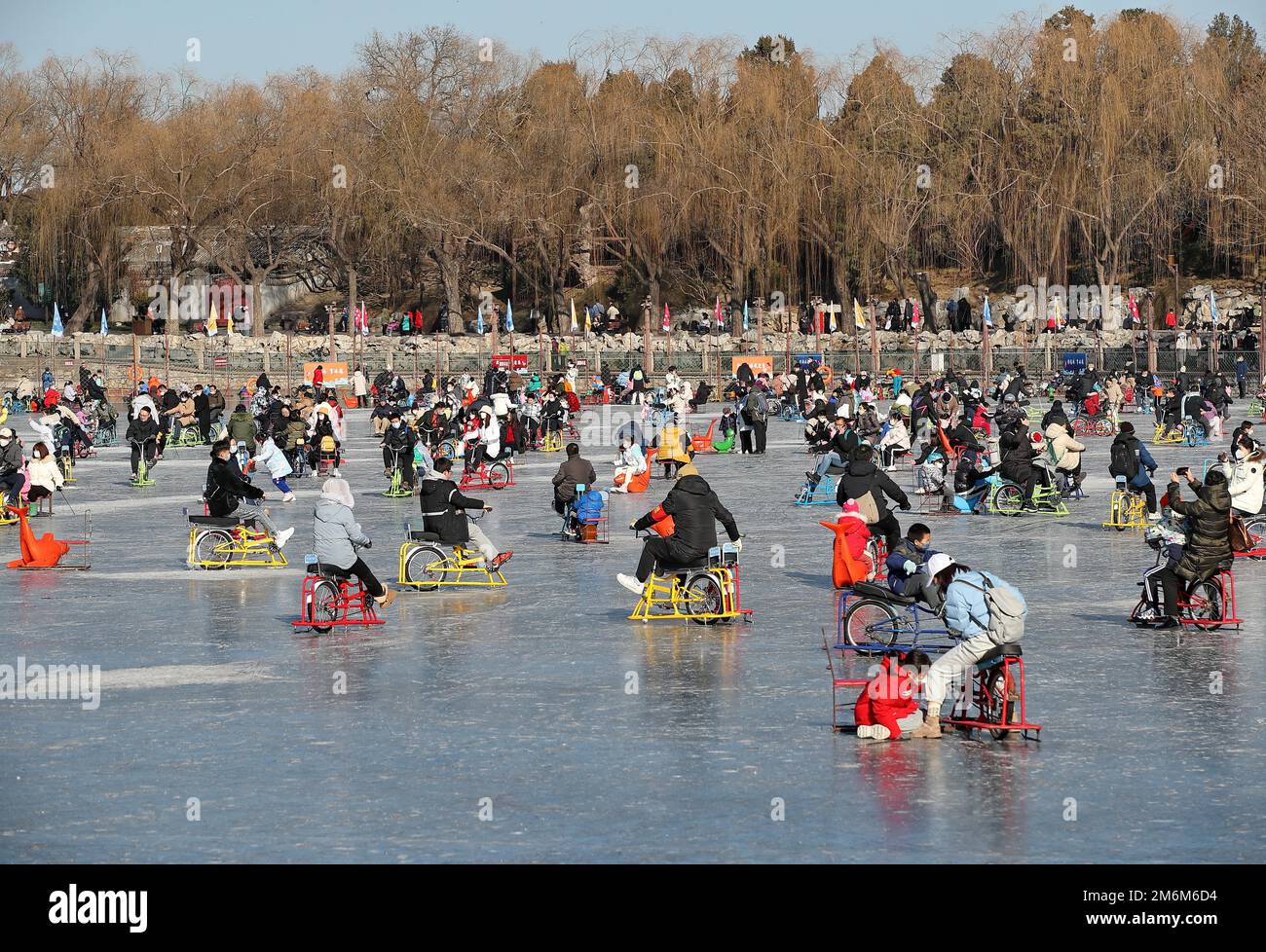 Visitors play at the ice rink in Beihai Park on the last day of the New ...