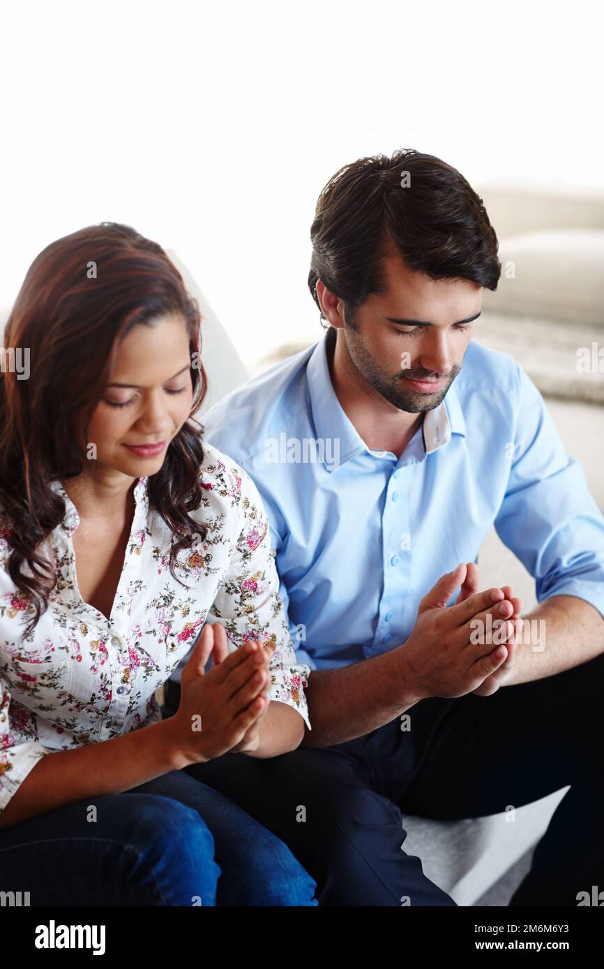 This relationship is strengthened by our faith. A young couple sitting ...